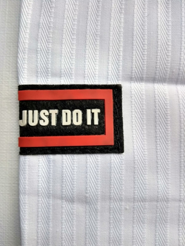 DOBOK TAEKWONDO NIKE GOLA PRETA